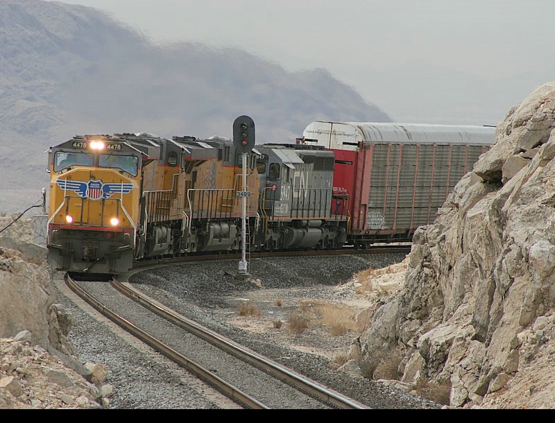 UP 4478 leads a eb hotshot up the Vegas Valley